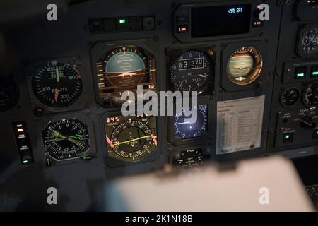 Flight instruments on an instrument panel in a cockpit of Boeing 777 ...