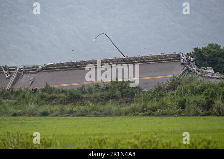 Yuli, Hualien County, Taiwan. 19th Sep, 2022. Two residents oversee a ...