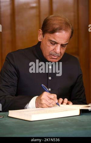 Prime Minister Shehbaz Sharif of Pakistan shakes hands with Deputy ...