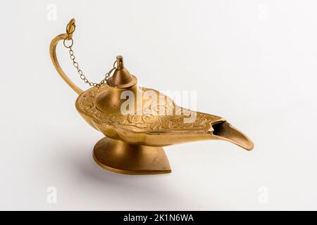 Aladdin's magic lamp isolated on white background Stock Photo - Alamy
