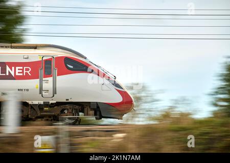 London North Eastern Railway ( LNER ) MK 4 DVT speeding along the east coast mainline railway at ...