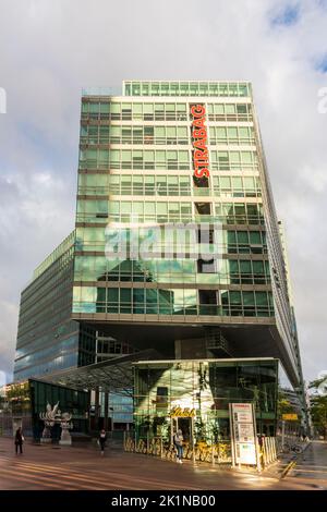Wien, Vienna: Strabag Headquarters in Donaucity, pedestrians at sunset ...