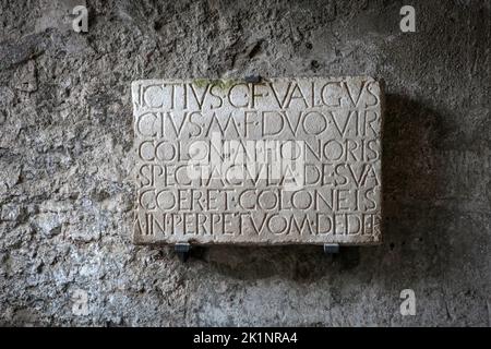 Pompeii Amphitheatre - Latin inscription Stock Photo - Alamy