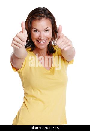 cropped view of smiling woman showing thumb up while standing near bowl ...