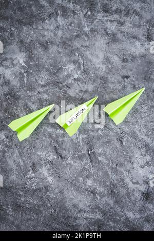 inflation text on paper plane going up with stats graphs, concept of ...