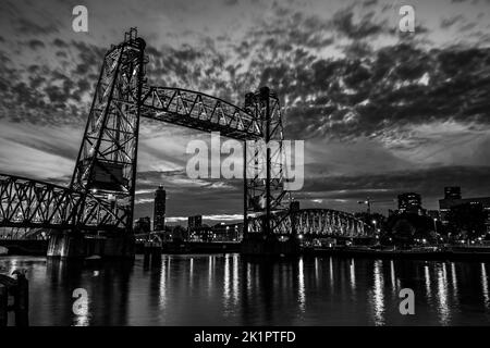 A beautiful shot of the De Hef (Koningshaven Bridge) with reflection in ...