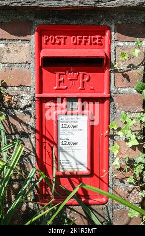 Cast iron ER II Post Office Post Box mounter in brick wall Stock Photo ...