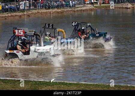 swamp buggies starting race, water splashing, vehicle sport, fast ...