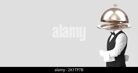 Waiter with tray instead of his head on light background. Banner for ...