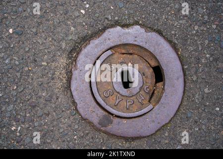 Gas Syphon, inspection lid, old gas supply, cast iron, footway, road ...