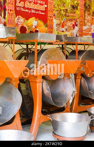 Grinding machines to make the traditional Mole sauce that originated in ...