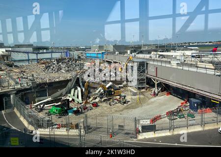 The demolition of the old Terminals C and D is seen from Delta's new $4 ...