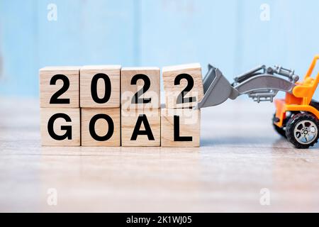 2022 Plan cube blocks with miniature truck or construction vehicle. New ...