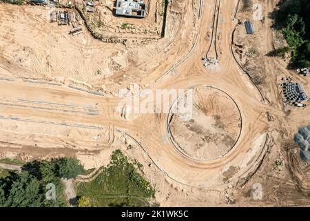 A top view of a roundabout with a construction site nearby Stock Photo ...