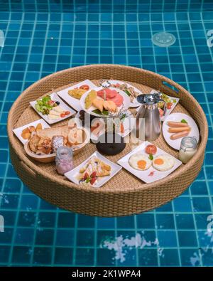 Floating breakfast in a swimming pool Stock Photo - Alamy