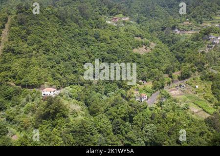 The village of Achadinha on green hillside near Boaventura in Northern ...
