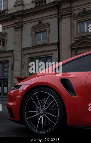 A back view of the red Porsche luxury car Stock Photo - Alamy