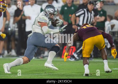 Eastern Michigan Eagles running back Samson Evans (22) stiffs arms ...