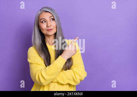 Photo of shiny thoughtful woman dressed striped sweater looking empty ...