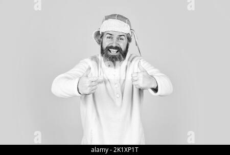 Christmas vacation. earflap hat protect from cold. bearded man wear ...