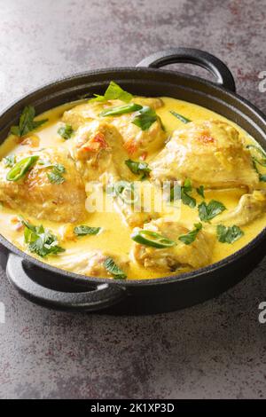 Kenyan Chicken in Coconut Sauce Kuku wa kupaka closeup in the plate on ...