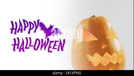 Image of halloween text over carved pumpkin bucket with sweets on black ...