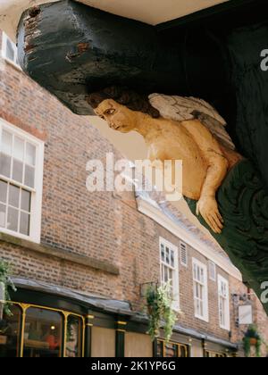 17th century carved ship mermaid figurehead on building in Stonegate ...