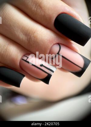 Creative design of nails on female hands. Art manicure Stock Photo - Alamy