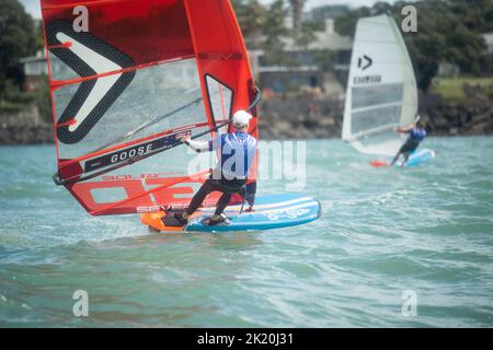 Competitors race in a national windsurfing hydrofoil race at the ...