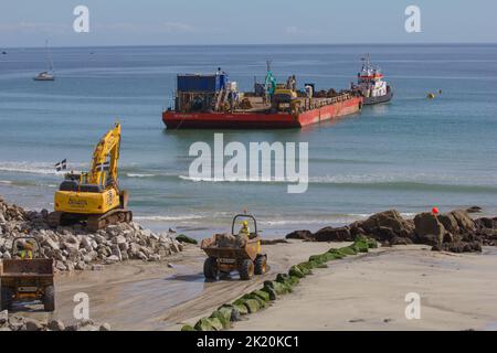 Transport barge after offloading armour rocks for breakwater ...
