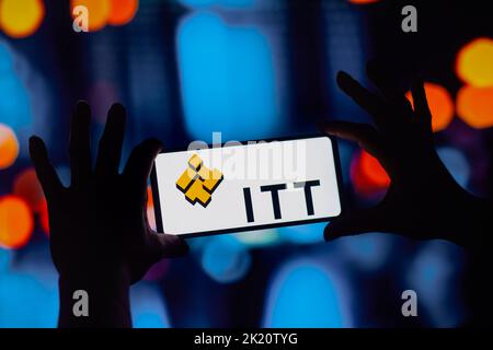 In this photo illustration, the ITT logo is seen displayed on a ...