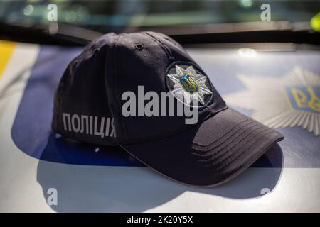 Hat of the ukrainian policeman with sign Police in ukrainian laguage ...