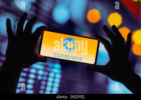In this photo illustration, the ConsenSys logo seen displayed on a ...