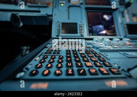Flight instruments on an instrument panel in a cockpit of Boeing 777 ...