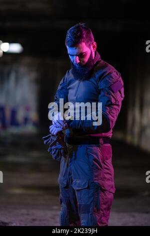 Modern warfare soldier checking navigation, time and other information ...