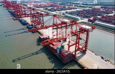 SUZHOU, CHINA - SEPTEMBER 22, 2022 - A container freighter berths at ...