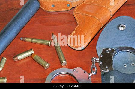 Security and defense police accessories on desk Stock Photo - Alamy