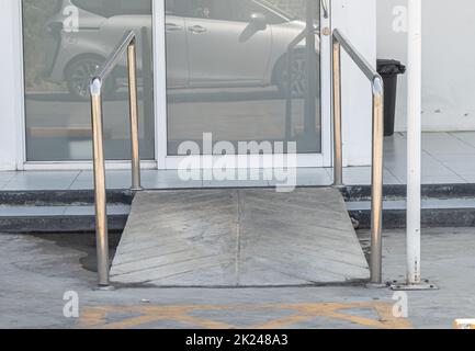 Building entrance trail with ramp for elder old or cannot self help ...