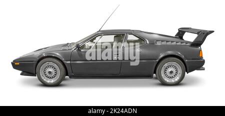 Historic mid-engined sports car isolated in white back Stock Photo - Alamy