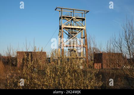 Headframe of old cold mine against sky, industrial heritage of Ruhr ...