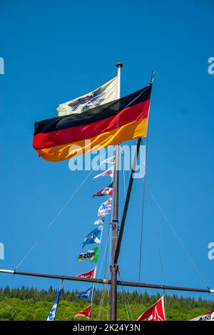 Neckargemuend, Germany: May 12, 2008: German flag at traditional ...