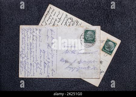 Potsdam, Germany - MAY 06, 2022. Old postcards from 1935 and 1939 with ...