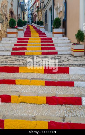 Spanish flag on stairs in Calpe Stock Photo - Alamy
