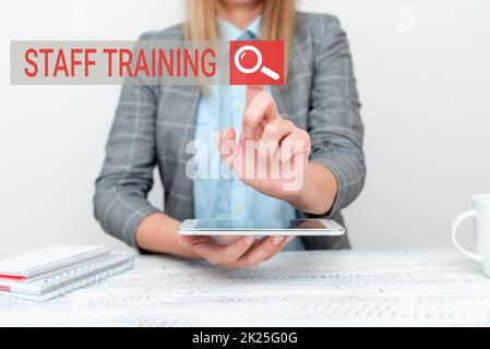 Text sign showing Staff Training. Business photo text program that ...
