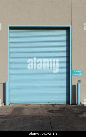 Loading Dock Garage Door on modern building Stock Photo - Alamy