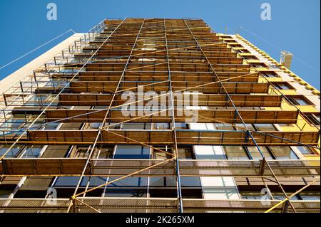 High apartments building construction bottom up view Stock Photo - Alamy