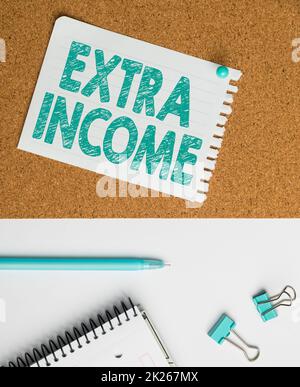 Hand writing sign Extra Income. Business showcase Additional fund ...