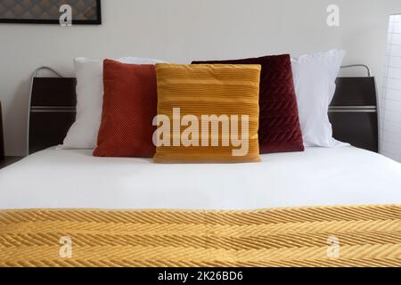 White luxury double bed with a beautiful headboard Stock Photo - Alamy