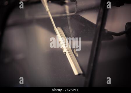 Vintage screen wiper on a car's windshield Stock Photo - Alamy