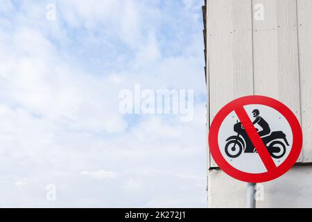 Motorcycle prohibition signs are installed in community areas to ...